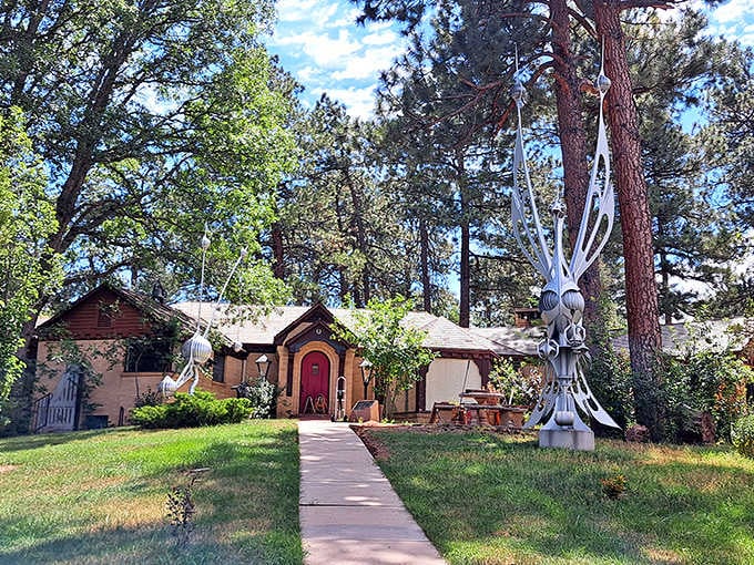 That charming cottage with the red door has the best front yard decoration game in all of Colorado, hands down.