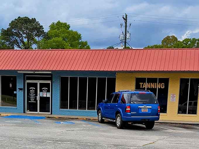 That cheerful blue and yellow exterior is your first clue that something delicious awaits inside this West Columbia treasure.