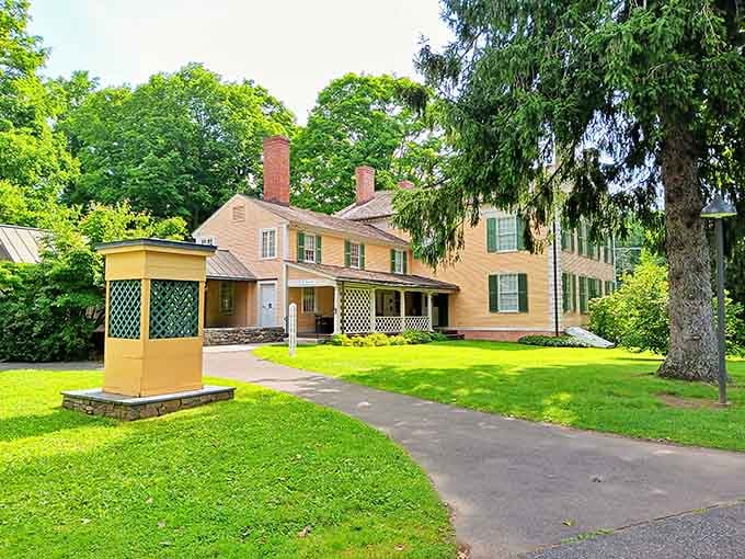 That yellow facade and those green shutters have been welcoming creative souls for over a century now.