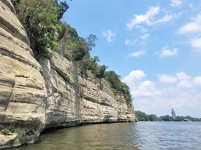 Towering sandstone walls rising from the river like nature's own skyscraper, minus the elevator and parking garage.
