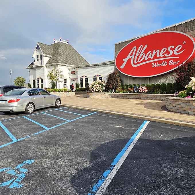 That iconic red sign promises sweet adventures inside, where your childhood dreams meet your adult credit card.