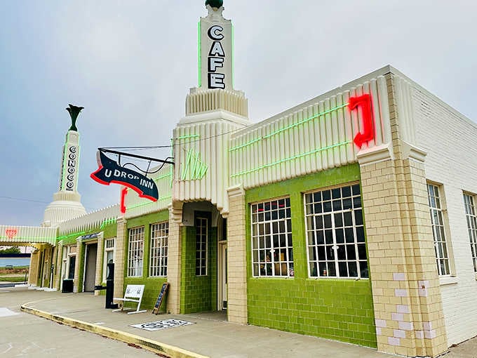 Art Deco dreams meet Texas reality in neon green glory that'll stop traffic faster than a tumbleweed convention.