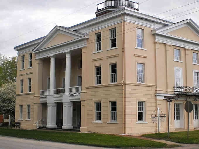 Greek Revival columns meet Swedish sensibility in this stunning building that refuses to pick just one style.