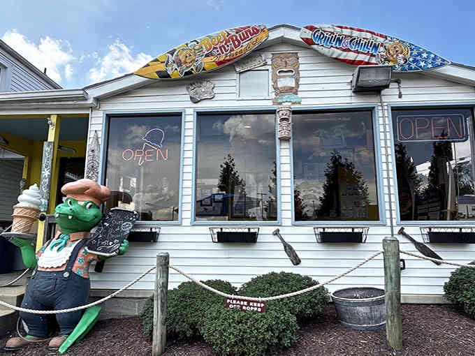 Those colorful surfboard signs aren't just decoration, they're a promise that eating here will feel like vacation.