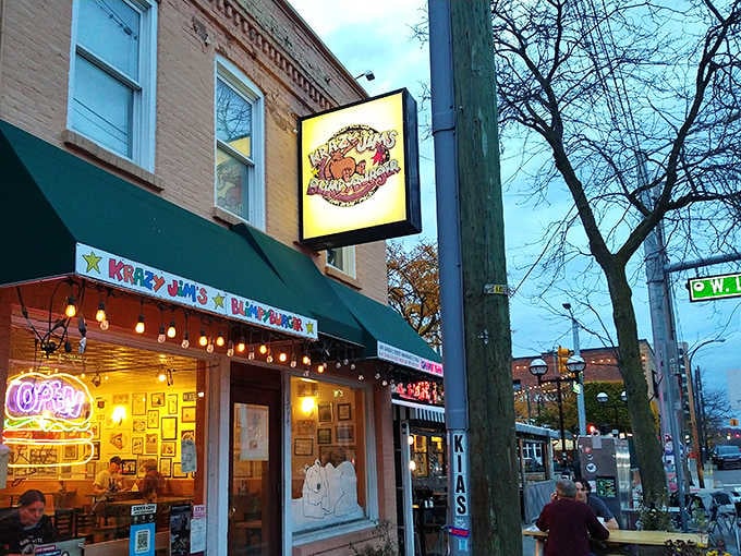 That neon "Open" sign glowing at dusk isn't just welcoming you; it's calling you home to burger paradise.