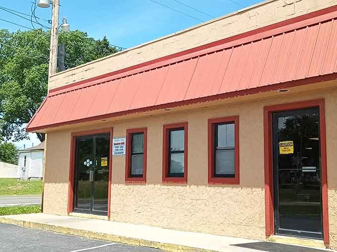 That red metal roof isn't just for show, it's your beacon to barbecue paradise in tiny Bates City.