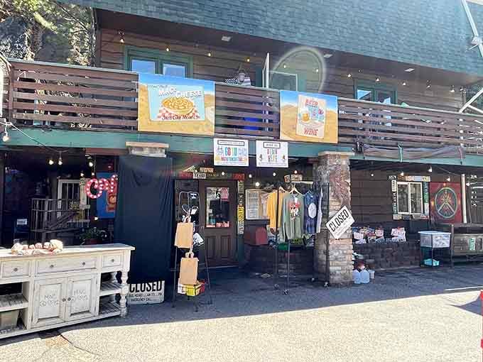 The rustic wooden exterior with patriotic bunting makes this mountain café feel like a summer celebration year-round.