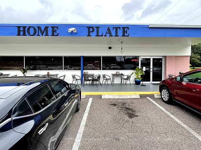 That bright blue awning isn't just decoration, it's a beacon calling you home for breakfast glory.