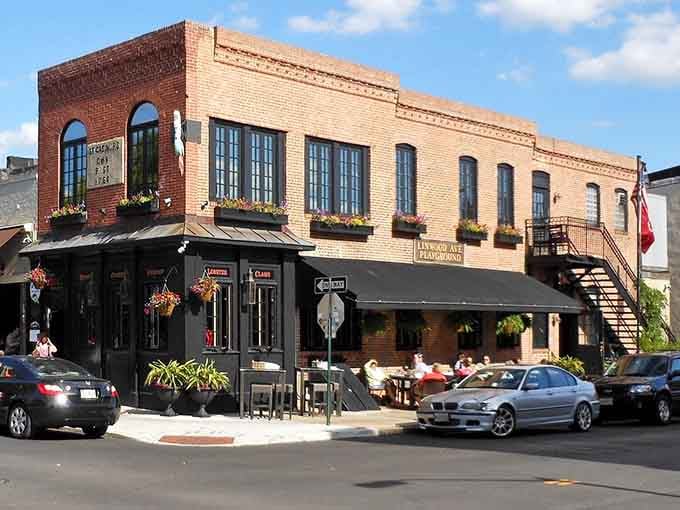 Those flower boxes and outdoor tables practically beg you to grab a seat and stay awhile, friend.
