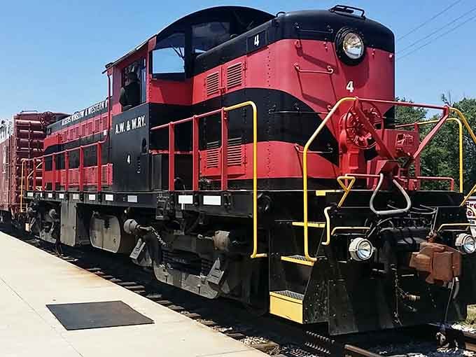 When your commute involves vintage diesel engines and tunnels through actual forests, you're officially winning at life in southern Indiana.