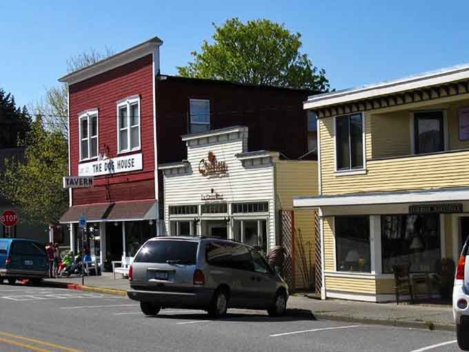 Historic storefronts painted in cheerful colors line the street where nobody's rushing to get anywhere important.