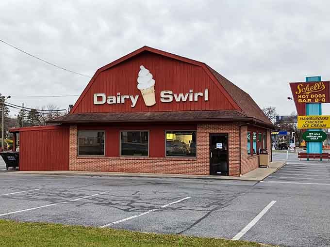 That red barn facade isn't just for show &ndash; it's your beacon to burger bliss and mini golf glory.