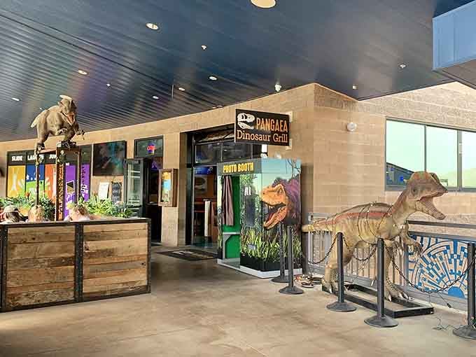 Those life-sized dinosaurs flanking the entrance aren't just for show; they're your first clue that dinner just got interesting.