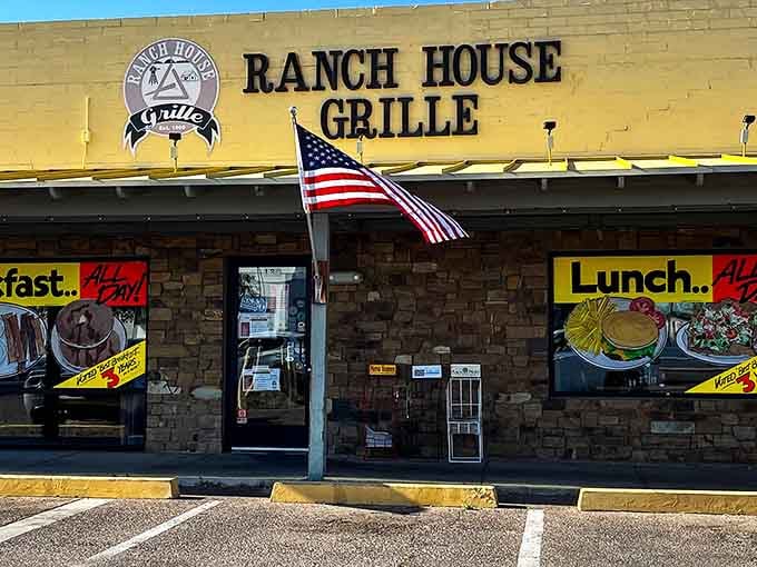 That yellow sign and stone facade promise the kind of honest American cooking that never goes out of style, breakfast through dinner.