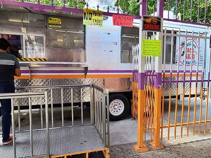 A working taco truck with character, where the focus is squarely on what's cooking inside.