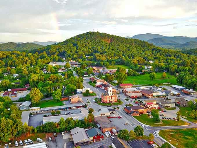 Mountains cradling a town square like nature's own protective embrace, complete with that perfect small-town charm everyone's been searching for.