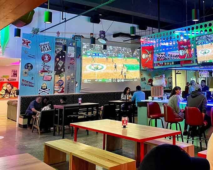 The neon glow through this venue isn't just lighting—it's a beacon calling you home to 1989.