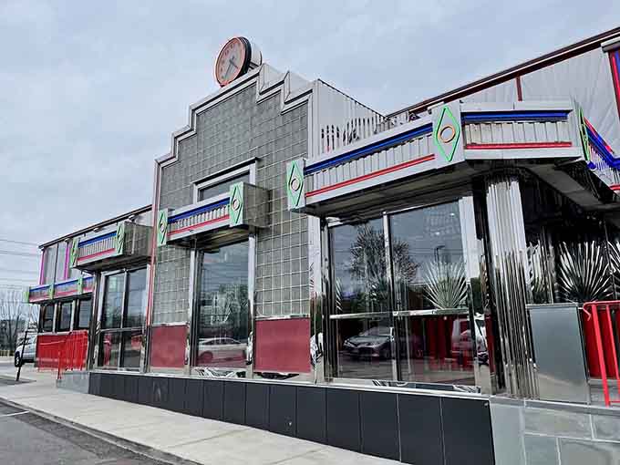 That gleaming Art Deco facade with chrome details looks like it drove straight out of a 1950s postcard.