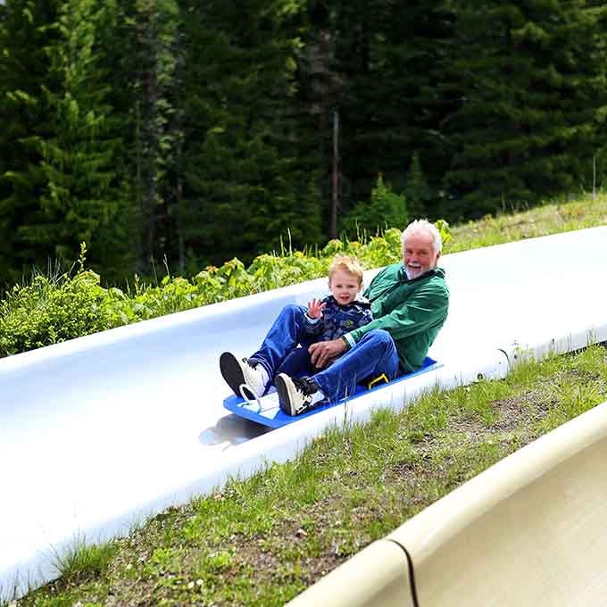 Generations of thrill-seekers sharing one sled, proving that the best adventures are the ones you don't have to take alone.