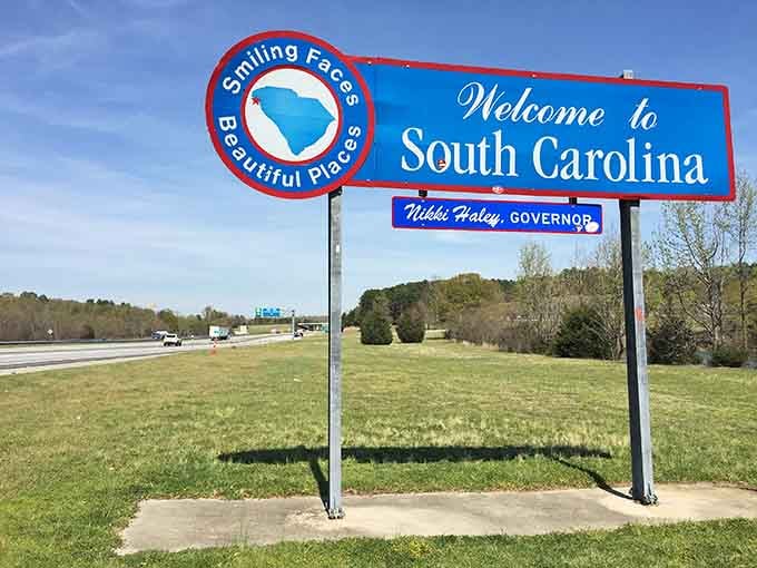 That blue and white sign isn't just marking a border&mdash;it's promising you've arrived somewhere special.