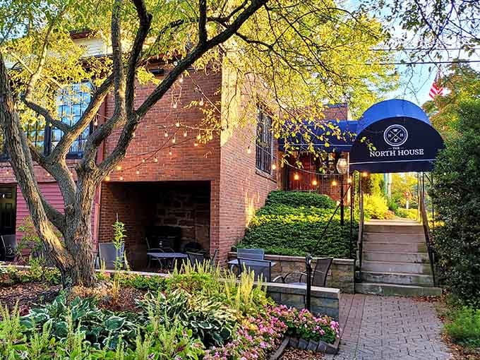 That blue awning beckons like a portal to culinary time travel, where history meets your hungry stomach.