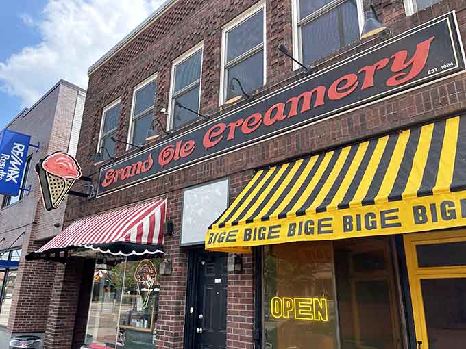 That striped awning and neon "OPEN" sign have been calling to ice cream lovers like a siren song for decades.