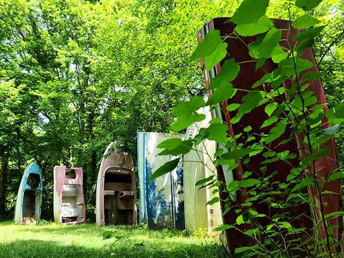 Each vessel tells its own story through weathered paint and creative positioning, transforming retired boats into vertical works of art.