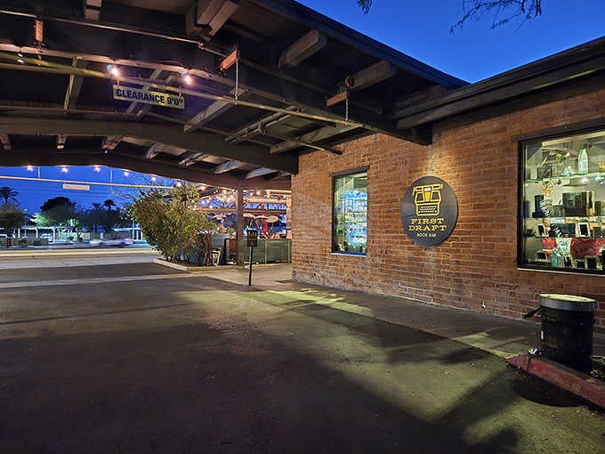 That warm glow isn't just the evening light, it's the promise of books and beverages waiting inside.