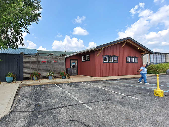 That charming red barn exterior hides a British secret that'll make you do a double-take.