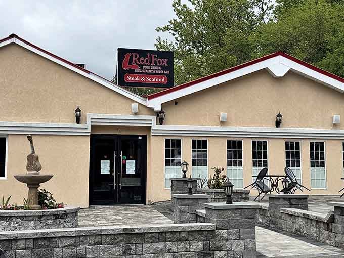 The welcoming exterior promises romance inside, complete with a fountain that sets the mood before you even walk in.