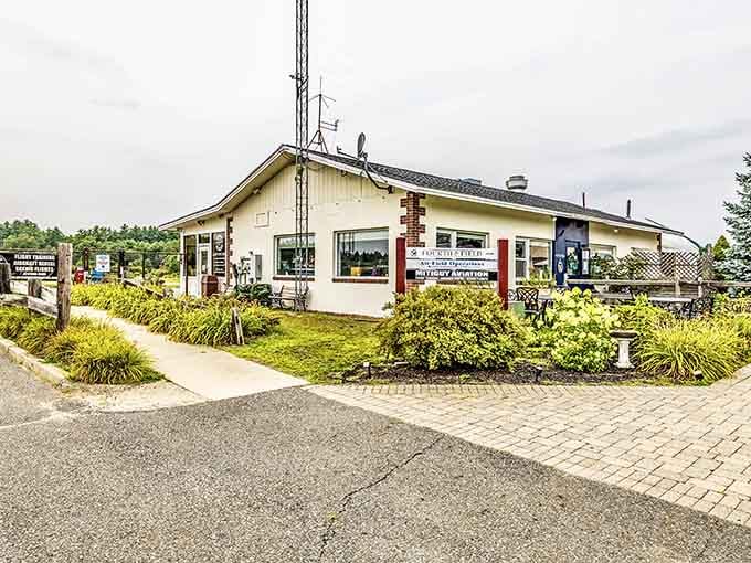 Classic New England charm meets aviation dreams at this cream-and-brick beauty that's redefining airport dining expectations completely.
