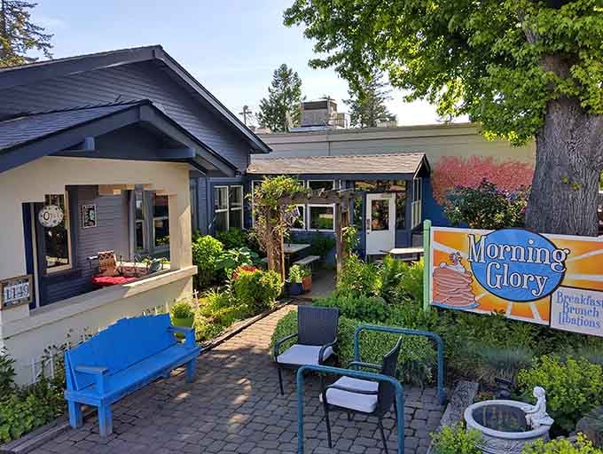 That charming blue exterior and welcoming patio practically beg you to pull up a chair and stay awhile.
