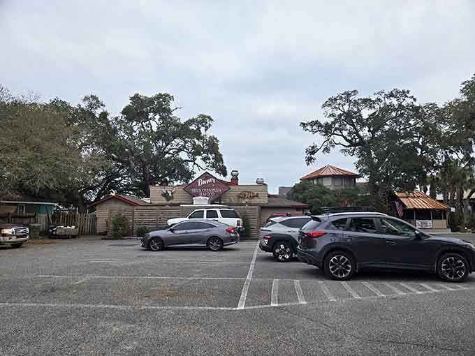 Spanish moss and good eats coexist peacefully here, proving nature and civilization can actually get along just fine.