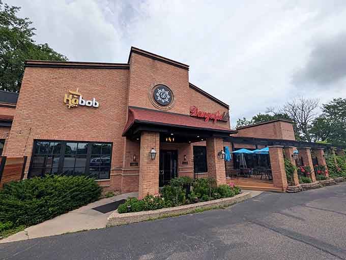 Notice the welcoming entrance framed by greenery, where countless memorable meals have begun over the decades.