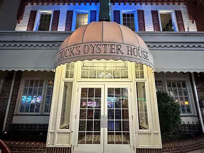 The entrance alone whispers promises of seafood excellence that the modern world keeps trying and failing to replicate.