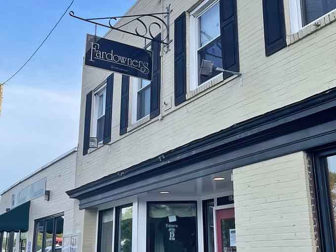 That classic hanging sign and crisp blue sky tell you something good is waiting inside this neighborhood gem.