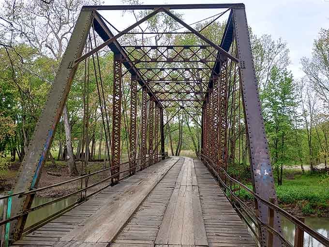 Those weathered wooden planks tell stories of countless crossings, each creak a whisper from another era.