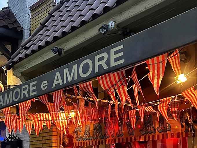 Those red and white striped banners aren’t just decoration, they’re a promise of the delightful chaos waiting inside.