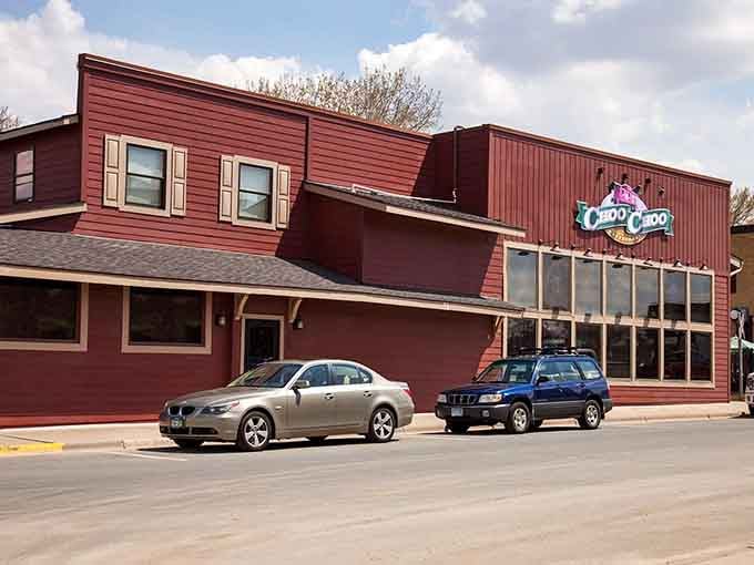 The red barn-style exterior promises something wonderfully unexpected waiting just beyond those doors for curious diners.