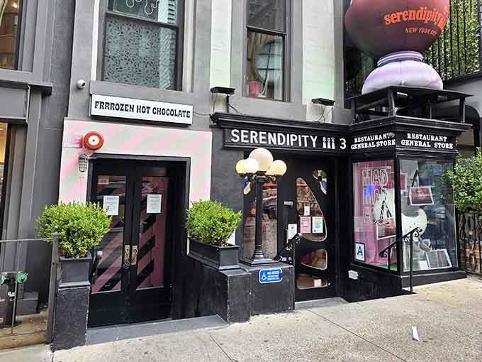 That vintage storefront with its striped awning looks like it time-traveled straight from a 1950s soda fountain dream.