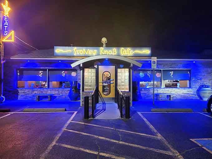 Evening lights transform the exterior into a glowing beacon for anyone seeking breakfast with a side of spectacular ambiance.