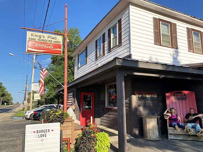That vintage Coca-Cola sign and "Burger Love" greeting tell you everything you need to know about this place's priorities.