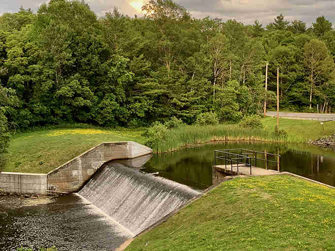 That spillway proves even functional infrastructure can be photogenic when surrounded by this much natural beauty.
