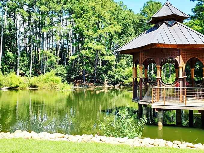 This tranquil gazebo overlooking the pond proves that sometimes the best seat in the house doesn't require reservations.
