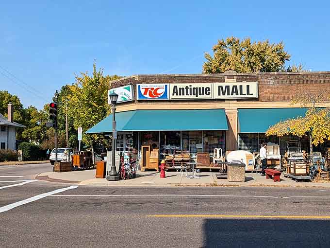 That turquoise awning beckons like a siren song to treasure hunters who know what's waiting inside.