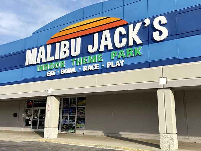 That colorful sunset logo promises exactly what's inside: a full day of eating, bowling, racing, and playing under one roof.