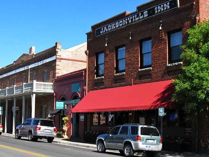 The Jacksonville Inn's red awning beckons travelers seeking comfort in a building that's hosted guests since stagecoach days.