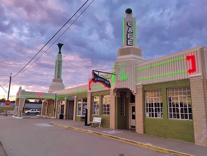 That neon glow against a Texas sunset isn't just architecture, it's pure roadside poetry in motion.
