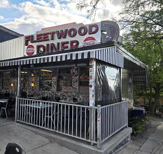 This isn't just a diner; it's a sticker-covered time capsule that never sleeps and always delivers breakfast perfection.