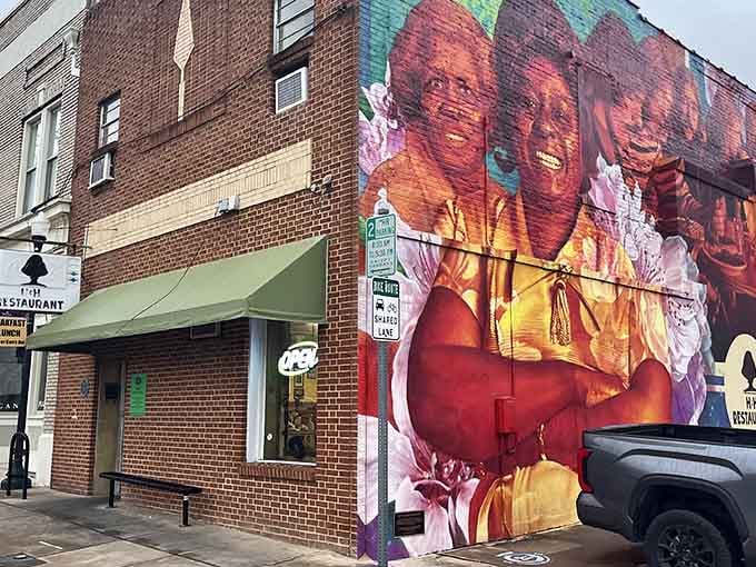 That mural isn't just street art; it's a love letter to Macon's soul food legacy painted in brilliant color.